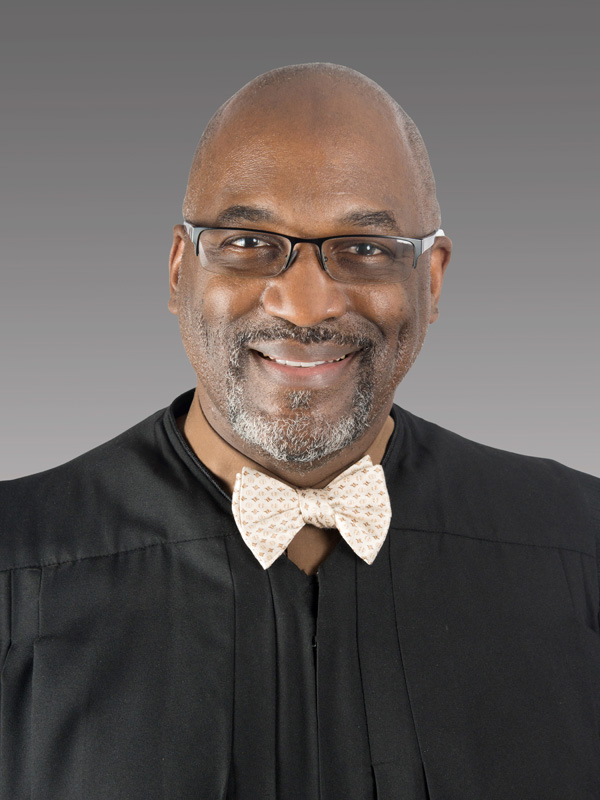 Man accused of running over Columbus police officers after gun theft ...